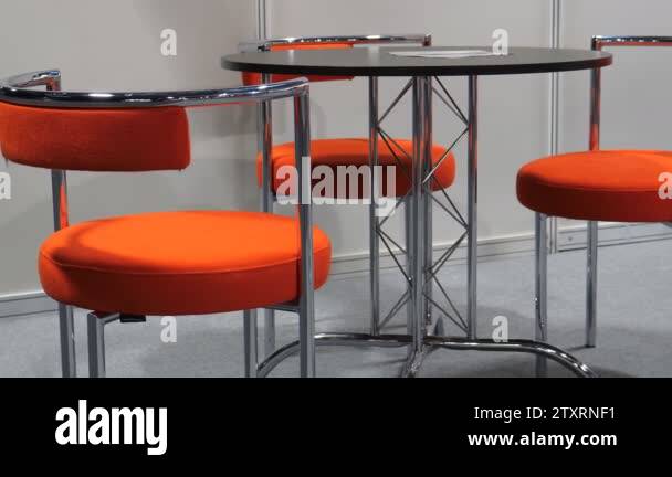 Round table with orange chairs Stock Videos & Footage - HD and 4K Video ...