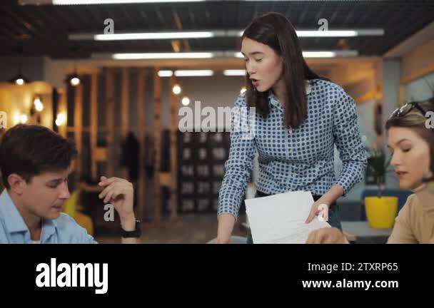 Angry business woman screaming at colleagues during office meeting ...