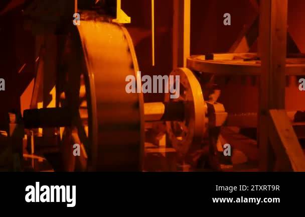 Traditional water mill model with a spinning circle, falling water and ...