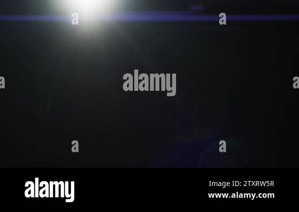 Corner Light Growing and Subsiding on the Black Background. Real Lens ...