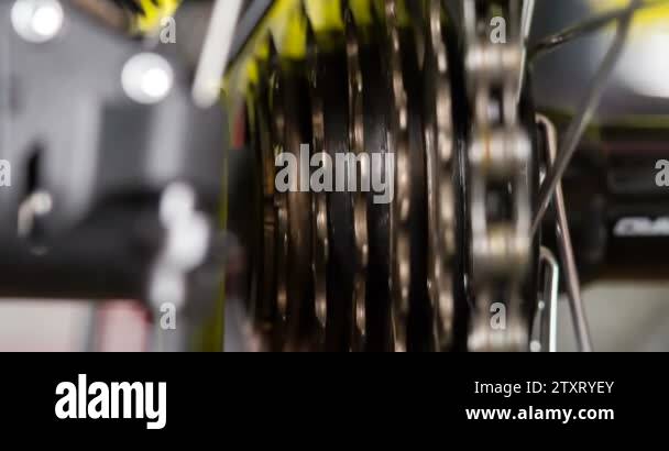 The bicycle chain rotates the gears. The mechanism rotates the wheel ...