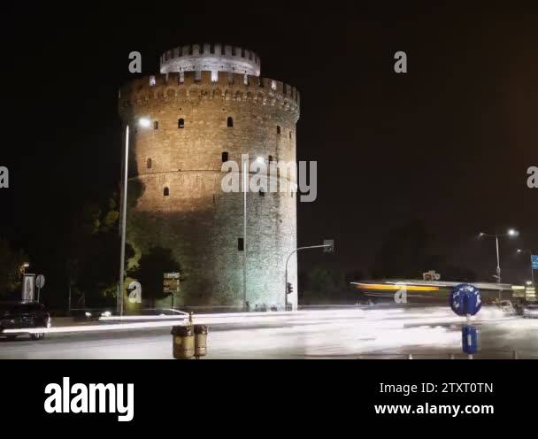 Thessaloniki, Greece The White Tower 6K night time lapse.The city ...