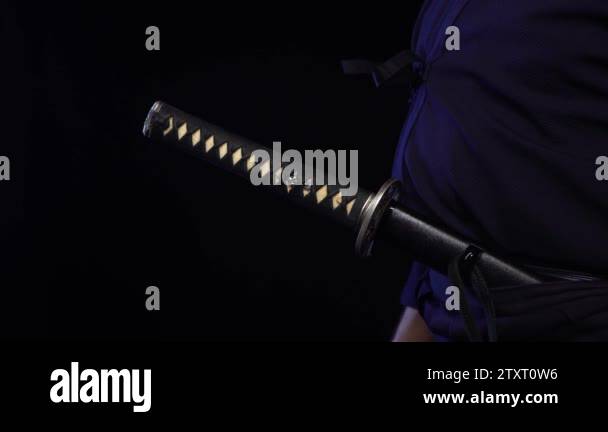 Samurai sword katana in hand. Katana sword holding in Samurai hand ...