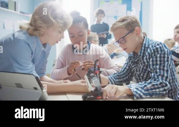 Elementary School Robotics Classroom: Diverse Group of Children ...