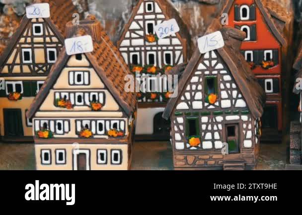 Beautiful candlesticks in form of houses in the style of fachwerk ...