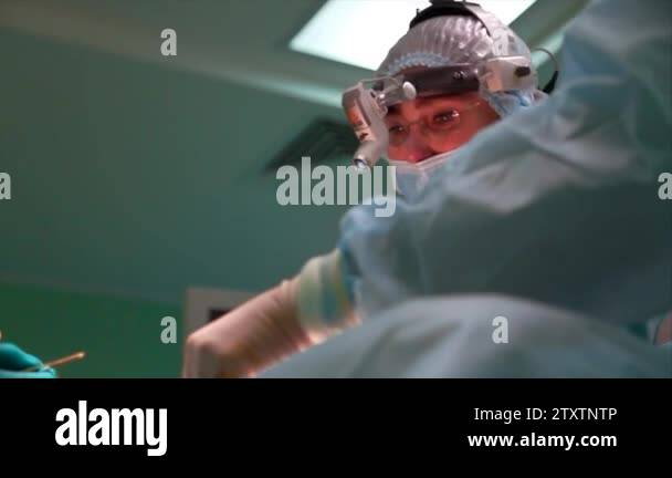 Portrait of Focused and Concentrated Surgeon Performing Surgical ...