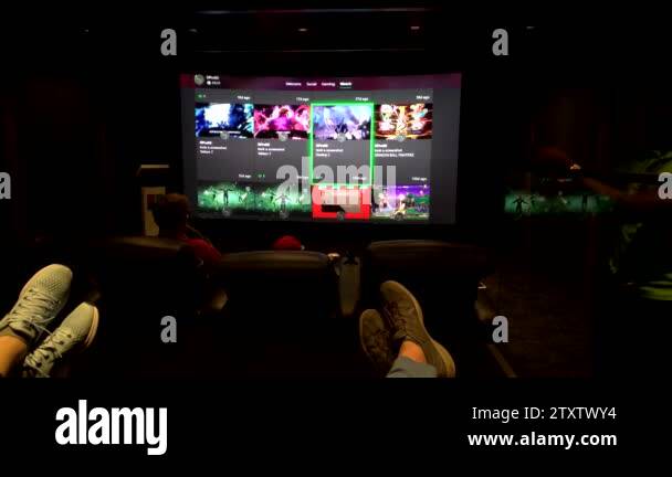 People watching demo movies in Microsoft store on 5th avenue in ...