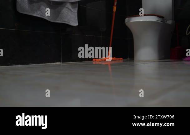 Mopping floor toilet Stock Videos & Footage - HD and 4K Video Clips - Alamy