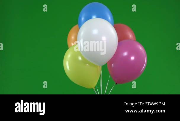 Green screen of colorful Balloons that rise Stock Video Footage - Alamy