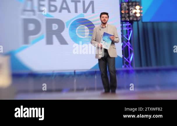 Male man TV presenter in a TV studio. TV presenter. TV host Stock Video ...