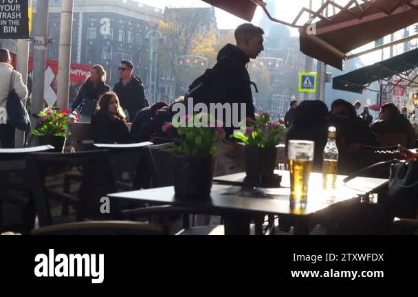 People sitting outside café Stock Videos & Footage - HD and 4K Video ...