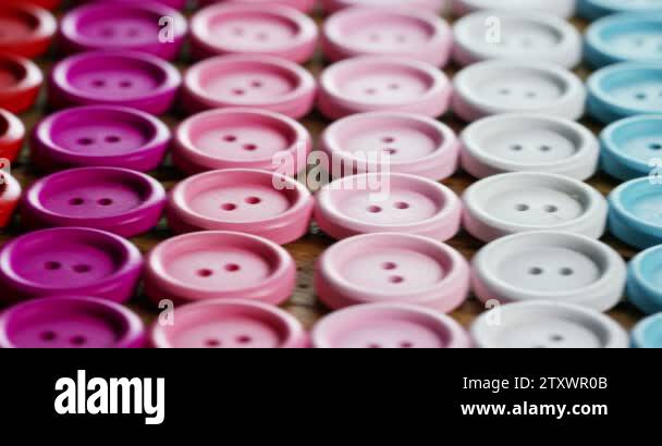Pink and brown buttons with sewing needle Stock Videos & Footage - HD ...