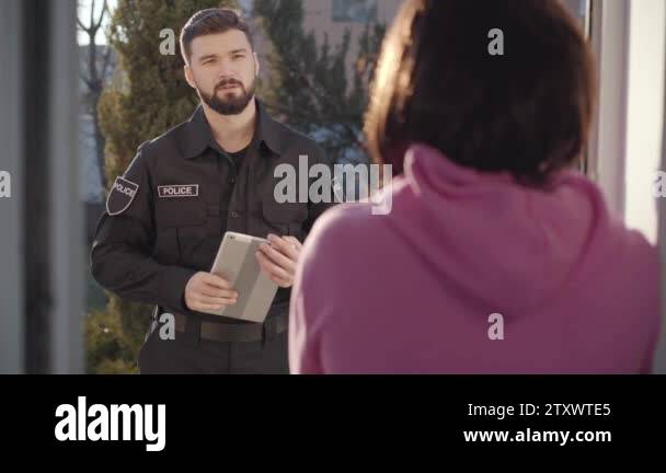 Woman talking to police officer Stock Videos & Footage - HD and 4K ...