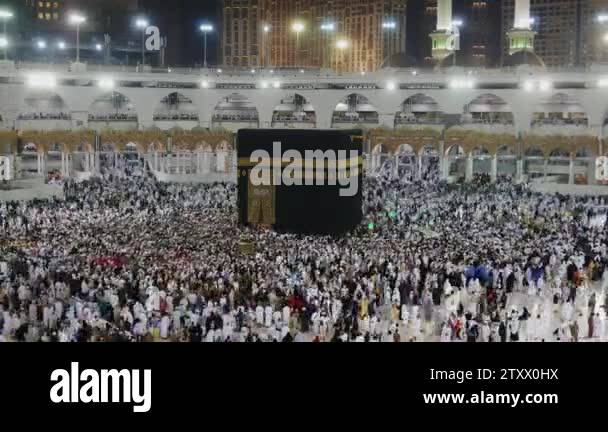 Stop motion of Muslim pilgrims perform circumambulation of the black ...