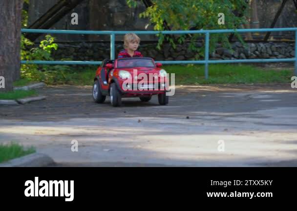 Boy riding car toy Stock Videos & Footage - HD and 4K Video Clips - Alamy