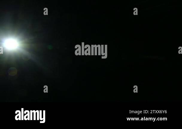 Effects light flashes and is moving back and forth. Black background ...