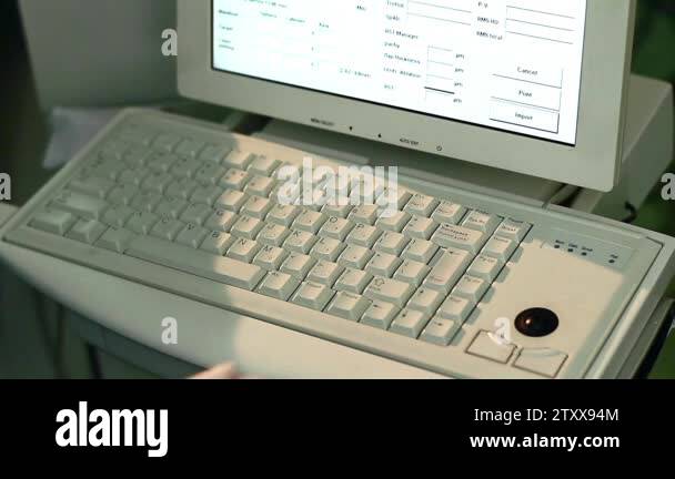 doctor working on your keyboard, The operation on the eye, doctor in ...