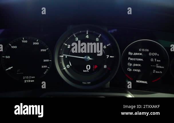 Dashboard speedometer and tachometer of a sports car. Includes ignition ...