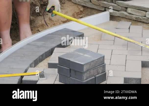 Laying Paving Slabs Close-Up. Road Paving, Construction Stock Video ...