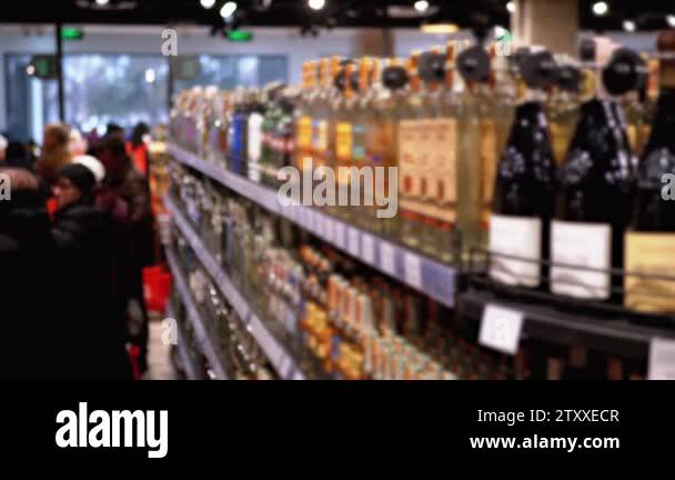 Alcohol Sale in Supermarket. Rows and Shelves of Bottled Alcohol in a ...