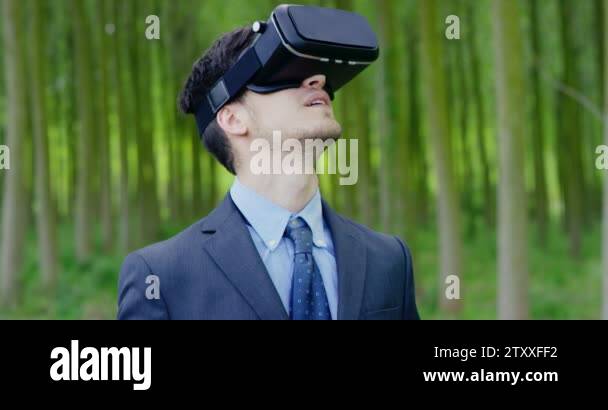 young nice man using 3d reality in life with oculus and augmented ...