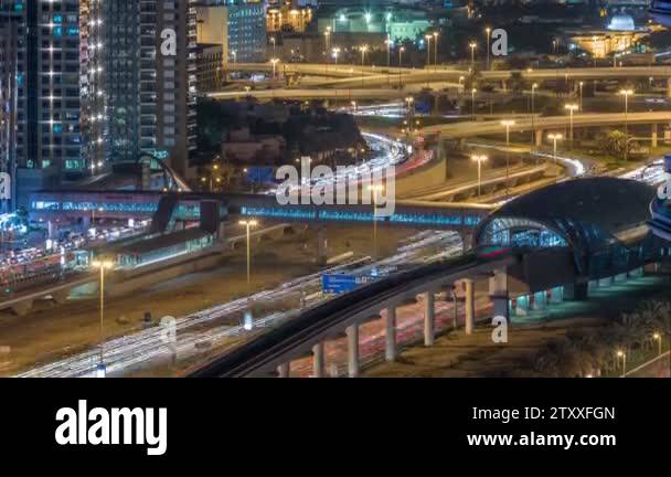 Futuristic building of Dubai metro and tram station and luxury ...