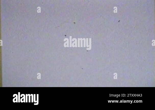 Vintage Old Damaged VHS Film Frame Loop/ 4k animation of an old vintage damaged VHS film tape ...