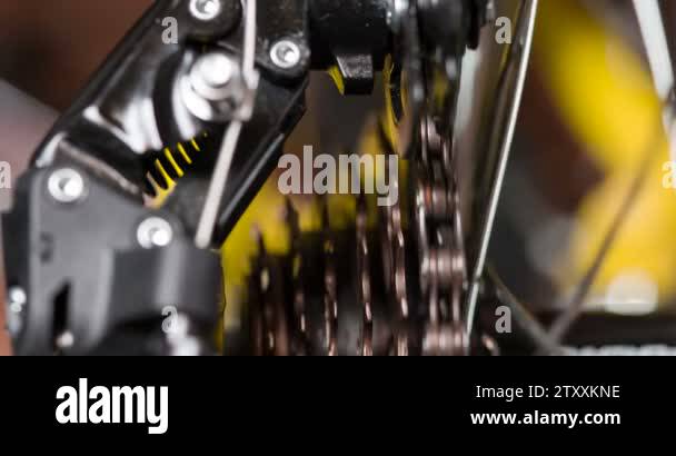 The bicycle chain rotates the gears. The mechanism rotates the wheel ...