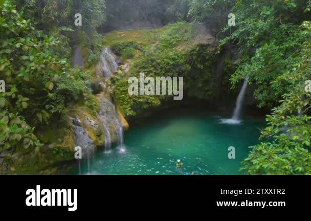 Kawasan Falls on Cebu Island, Philippines. People swimming at the ...
