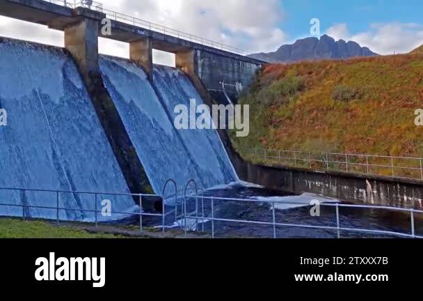 The Storr Lochs hydroelectric power station nestled under the mountains ...