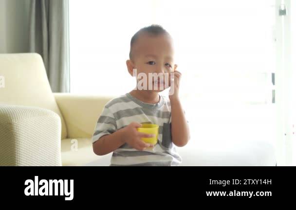 Itchy Boy Scratching. Two to three years old child scratches his face ...