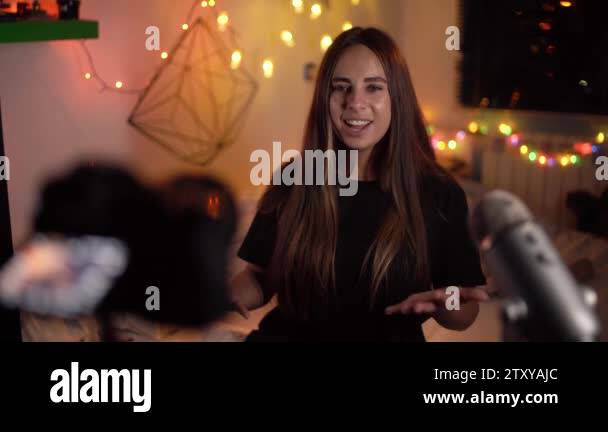 Happy young woman vlogger speaking looking at camera smile happy ...
