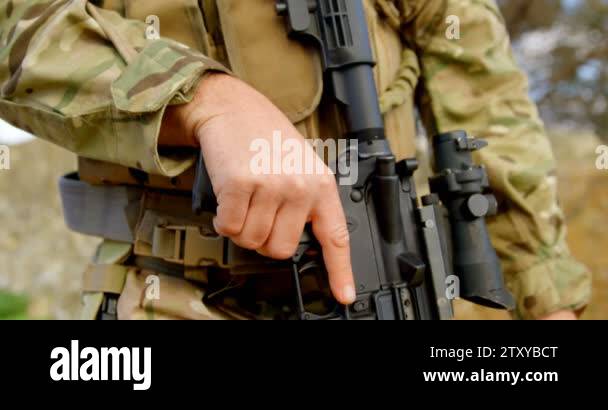 Army soldier holding weaponry military safety helmet Stock Videos ...
