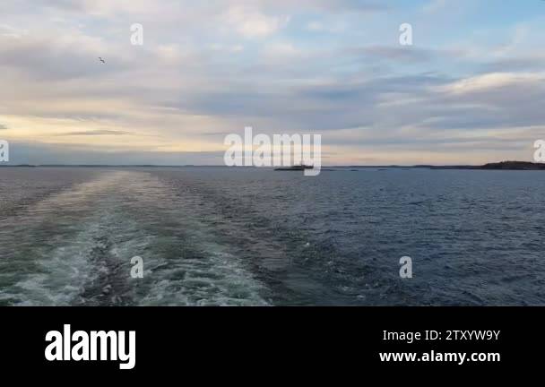 Powerful waves following the ship. Waves behind the stern of the ship ...