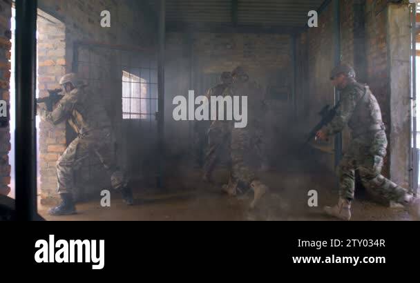 Military soldiers conducting rescue operation during training at ...