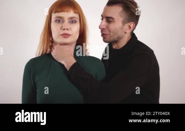Hand strangling neck Stock Videos & Footage - HD and 4K Video Clips - Alamy