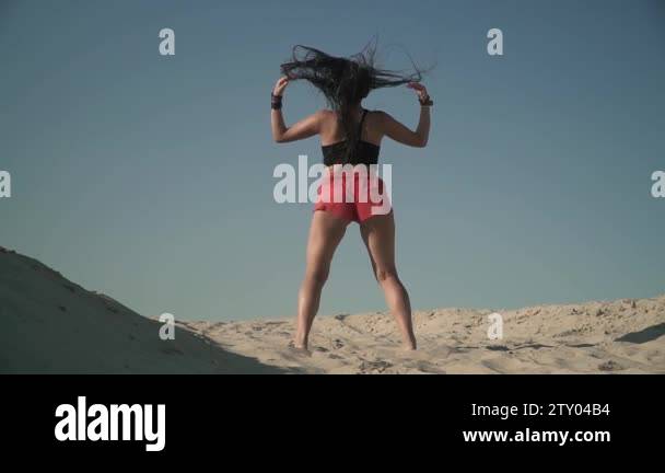 Attractive Young Girl Dancing Twerk At The Beach Tanned Girl In Short