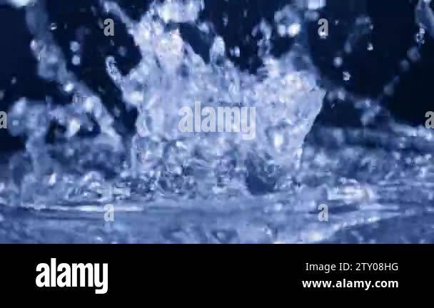 spinner spinning and falling into the water with splashes Stock Video ...