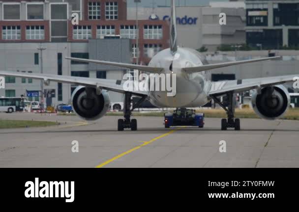 Boeing 777 towing from service Stock Video Footage - Alamy