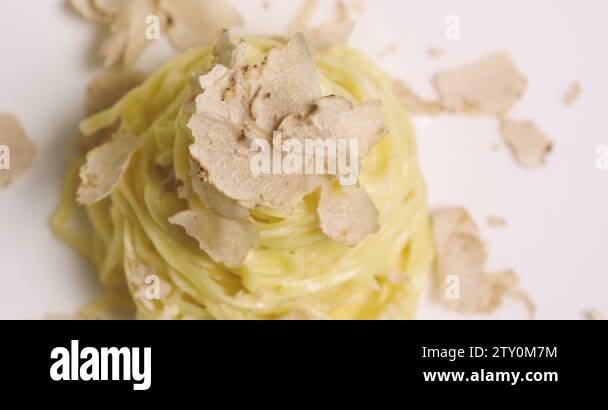 Egg pasta dish, typical Italian, with fine white truffle grated on top ...