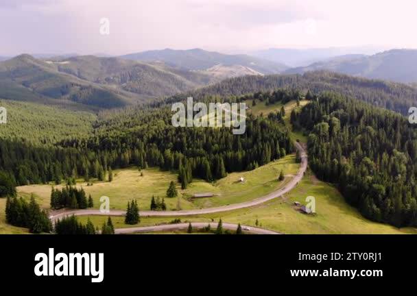aero shooting. beautiful summer landscape, mountains sheltered by a ...