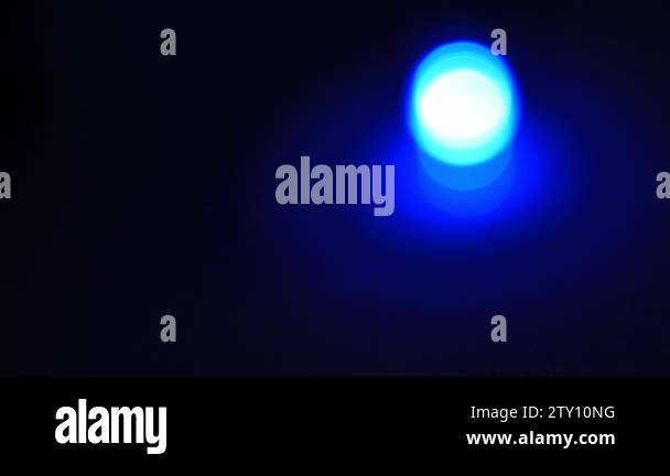 The blue garland diode slowly lights up and fades out. The light bulb ...