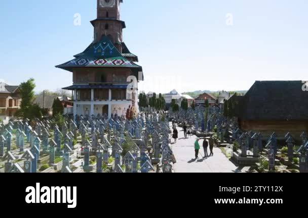Aerial view of Church in Merry Cemetery, Colored Tombstones with ...