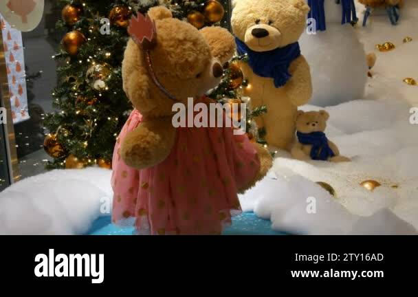 Princess toy brown teddy bear in a dress and crown spinning around in a ...