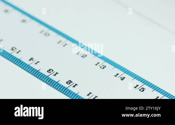 Draw a straight line on white paper with a ruler and a pencil Stock ...