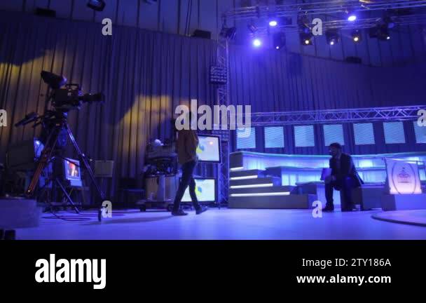 Male man TV presenter in a TV studio. TV presenter. TV host Stock Video ...