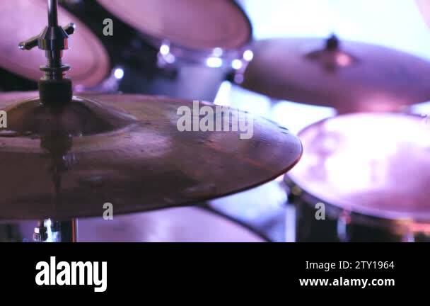 Male hand of professional drummer hits with drumstick on cymbal and ...