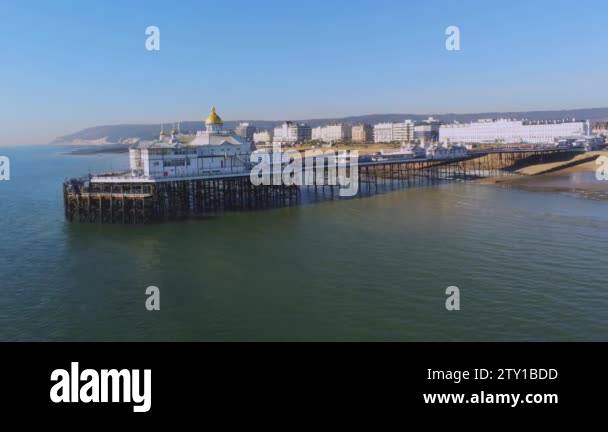 The town of Eastbourne and its famous pier from above Stock Video ...