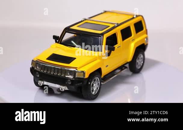 BERLIN, GERMANY - JANUARY. 2019: Yellow Hummer H3 scale model SUV car ...