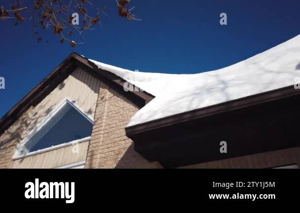 Roof of the chalet or cottage in residential community under the weight ...